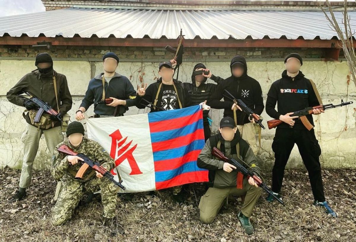Left: Hoods Hoods Klan in February taking up arms against Russia in ...